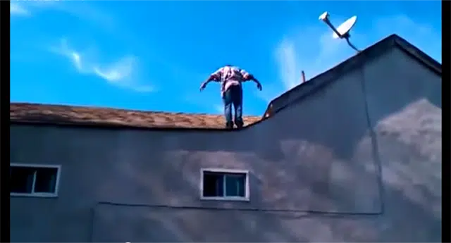 Guy Gets Bet $20 To Backflip Off 2-Storey Building; Result Is Priceless