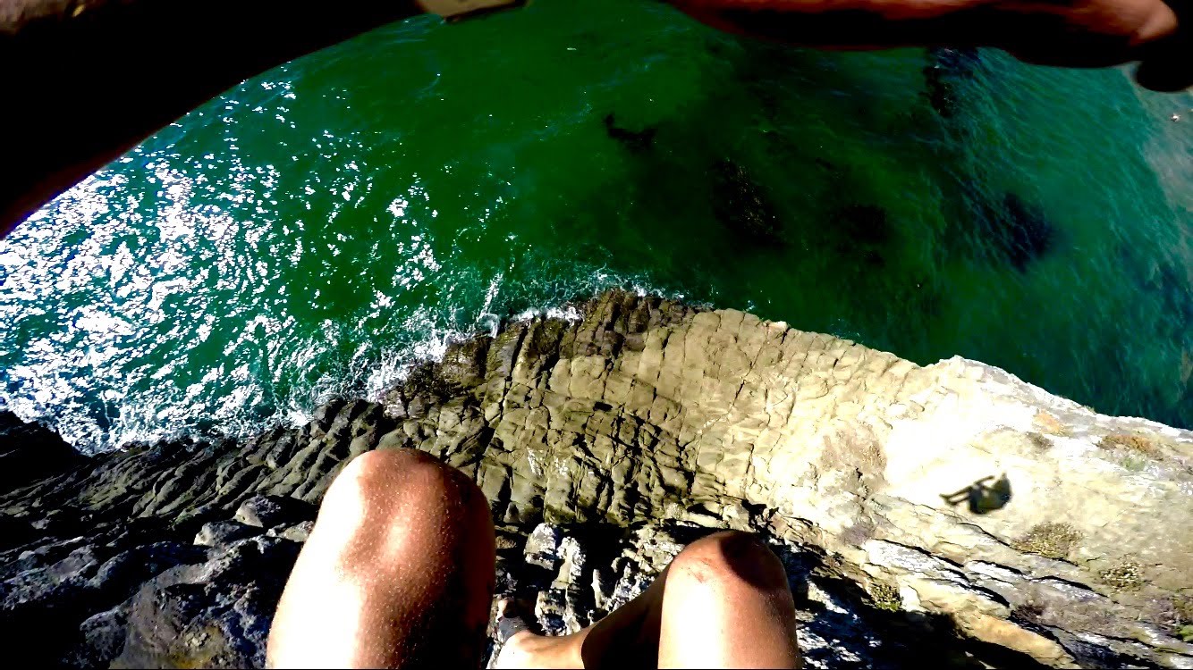 Idiot Attempts Insane Cliff Jump, Barely Makes It Out Alive (VIDEO)