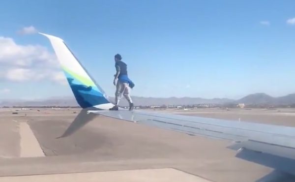 Man Climbs Onto Airplane's Wing Before Takeoff And Breaks His Face
